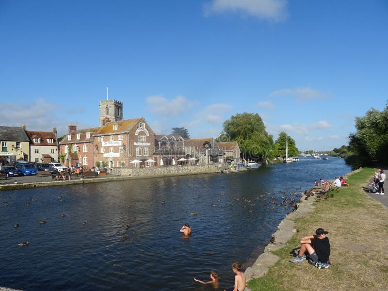 View of People Enjoying the Sunny Day at the River Frome in Dodington ...