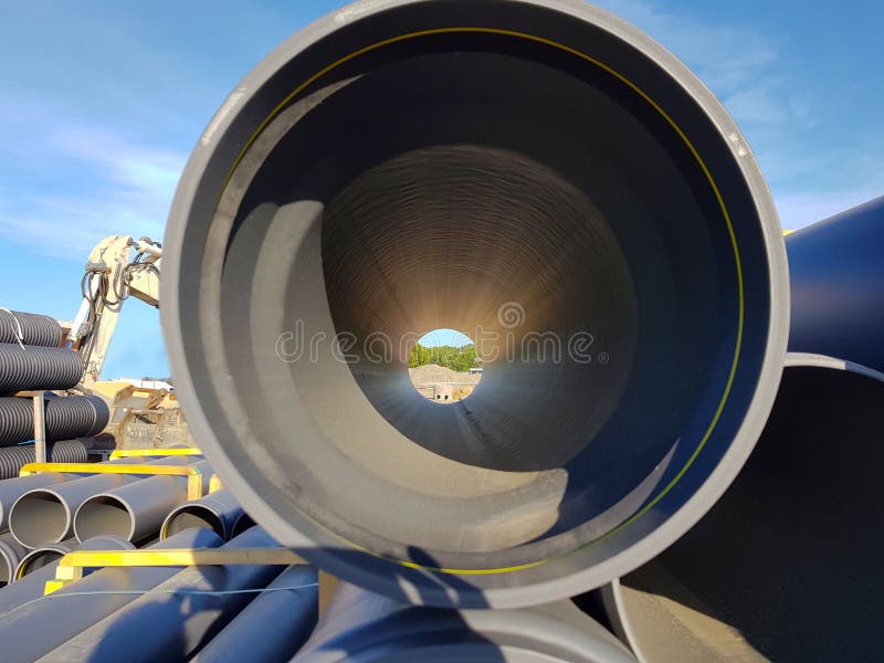 View through the Pipe on the Construction Site. Stock Photo - Image of ...