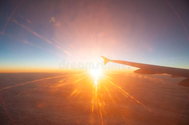 View from the Plane on a Beautiful Orange Sunset Stock Image - Image of ...