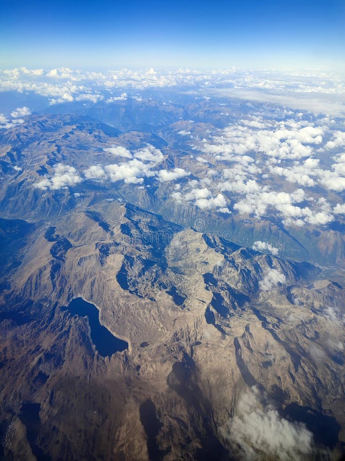 View from the Plane Down To the Blue Mountains or Clouds Stock Image ...