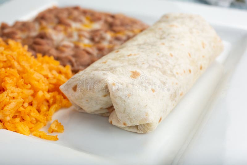 Burrito rice and beans stock photo. Image of setting - 281905802
