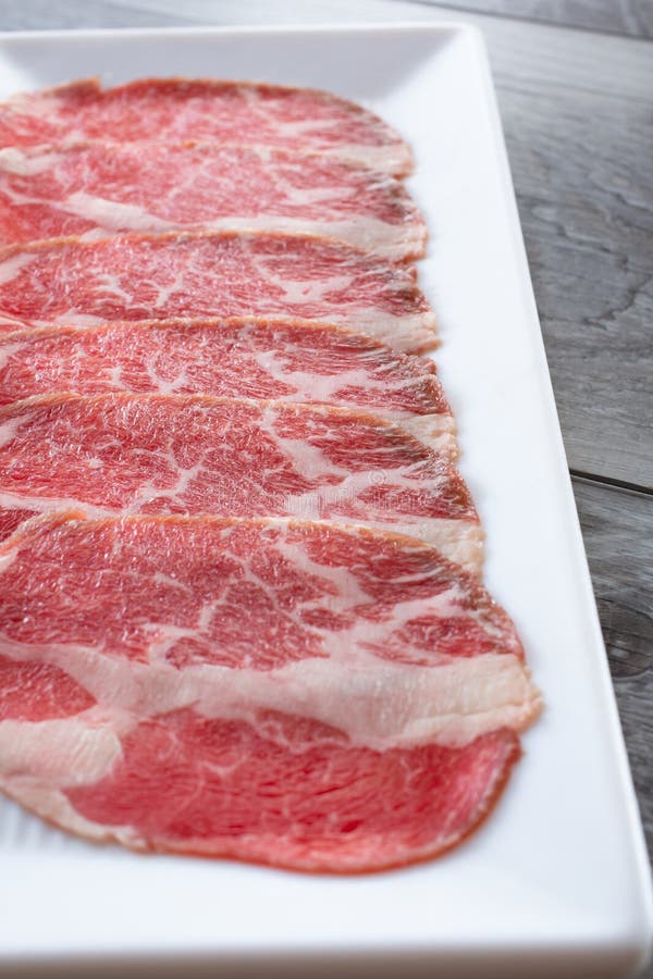 Plate of Raw Slice of Beef Chuck Roll Stock Image - Image of product ...