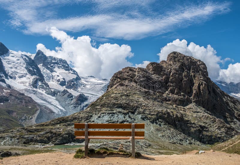 Bench at a mountains stock image. Image of grass, nature - 103633481