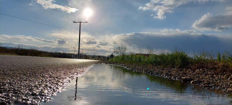 View of the Pond, the Road and the Sky from Another Angle Stock Image - Image of angle, road ...