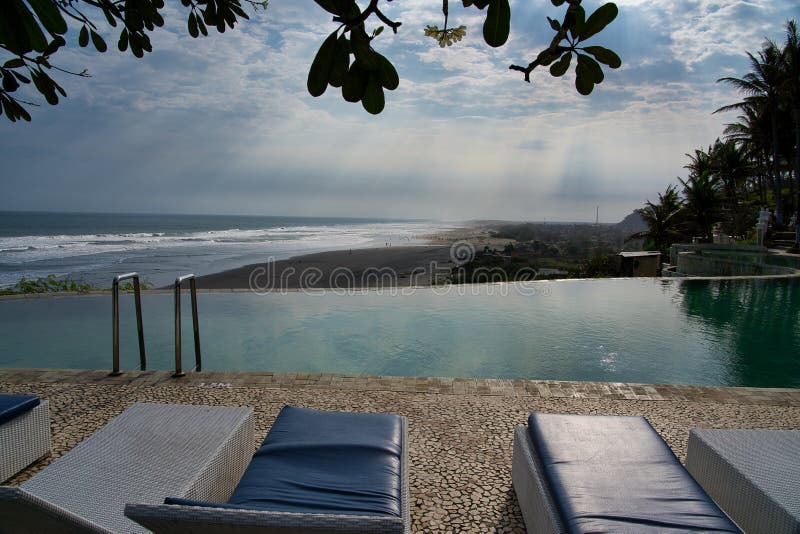 Pool and beach. stock photo. Image of clouds, resort - 191526420