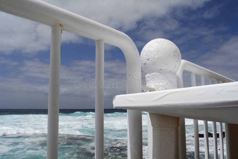 View through White Painted Railings of the Ocean Stock Image - Image of ...