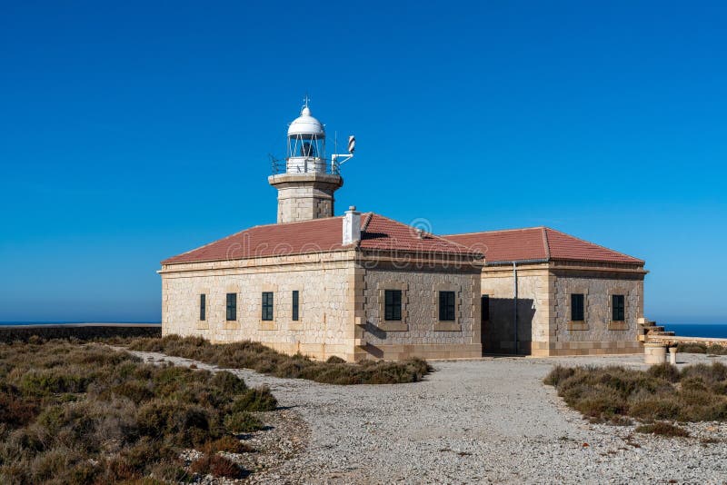 View of the Punta Nati Lighthouse in Northwestern Menorca Stock Image ...