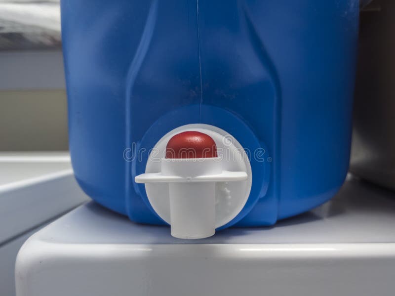 View of a Push Button Top Jug of Liquid Laundry Detergent on Top of a ...