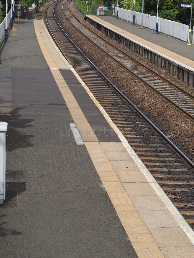 Railway station platform stock photo. Image of cityscape - 121557706