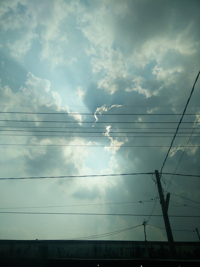 A View of after Rain Cloud. Shiny Sunlight Forced Onto it. Make an ...