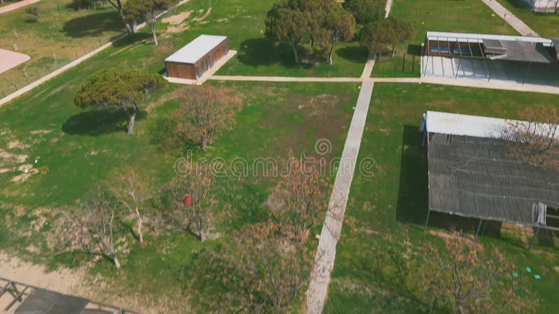View of Rectangle Tents and Cabins in Green Area at Belek Beach Park ...
