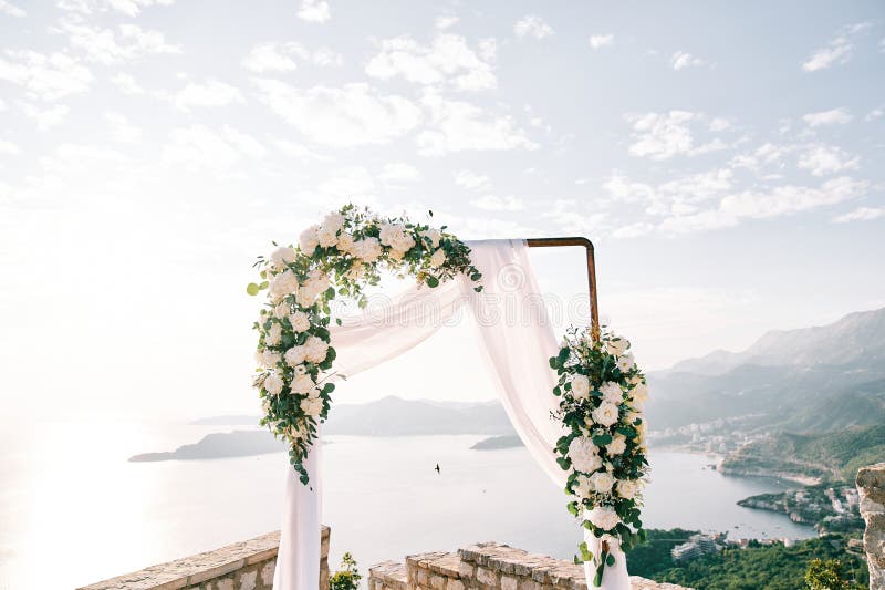 View through a Rectangular Wedding Arch To the Bay and Mountains Stock ...