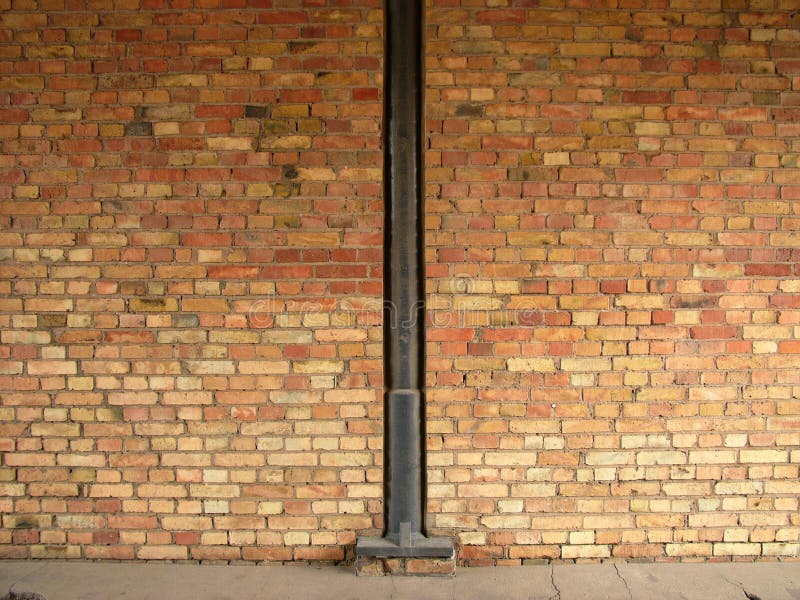 View of Red and Brown Brick Wall with a Black Beam on the Middle Stock ...