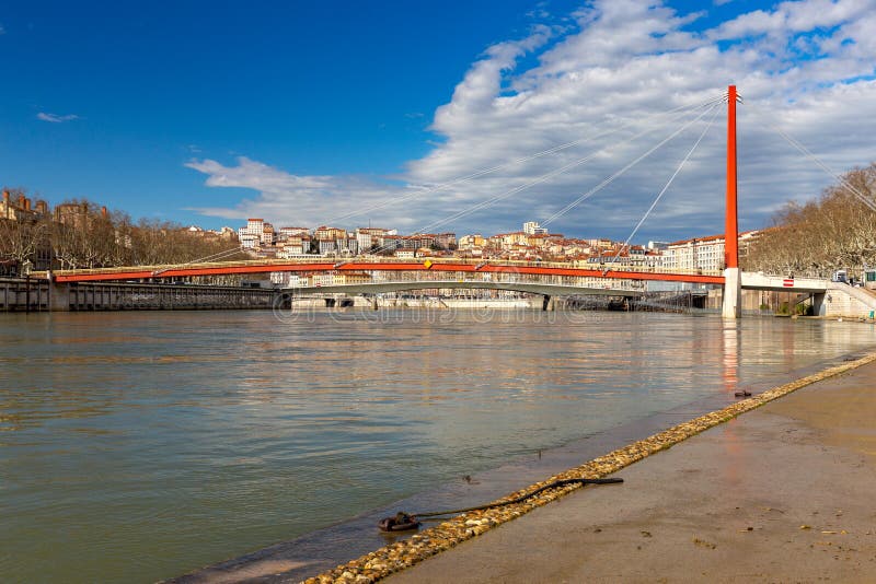 Lyon. Red Cable-stayed Bridge Over the Saona River. Stock Photo - Image ...
