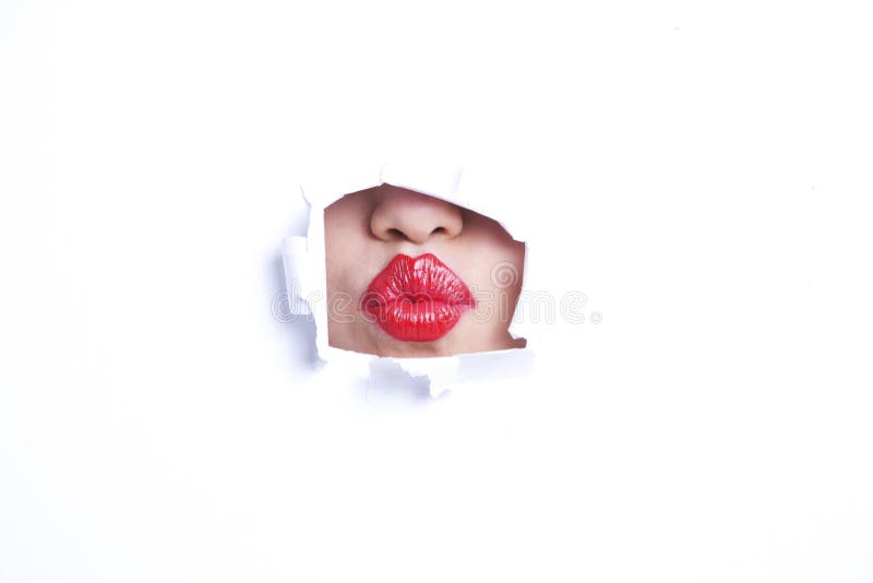 View of Red Puckered Lips through Paper Hole Stock Photo - Image of ...