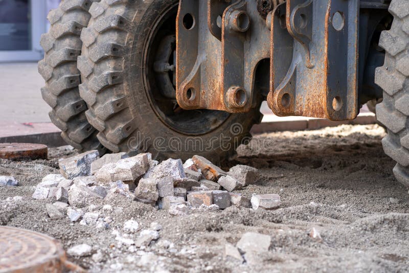 View of the Remains of the Old Road Surface Under the Wheels of a Truck ...