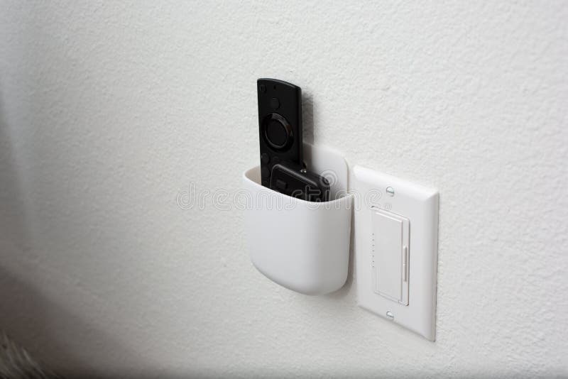 Remote Control Wall Caddy, Mount, Holder Stock Photo - Image of switch ...