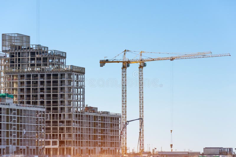 View of a Residential Complex Under Construction with High Cranes ...