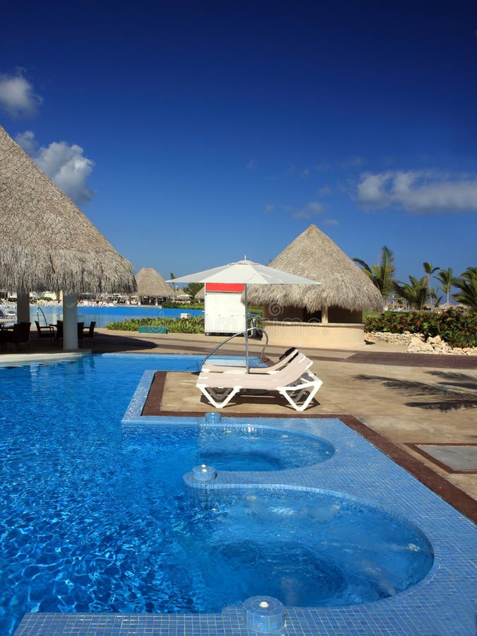 View of Resort with Chairs and Pool Stock Photo - Image of reflection ...