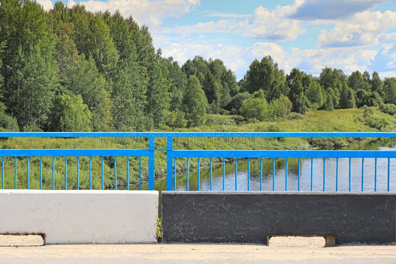 View of the River Bank through the Bridge Railing Stock Image - Image ...