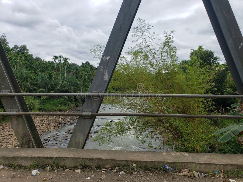 View of a River through a Bridge Frame Stock Image - Image of rocks ...