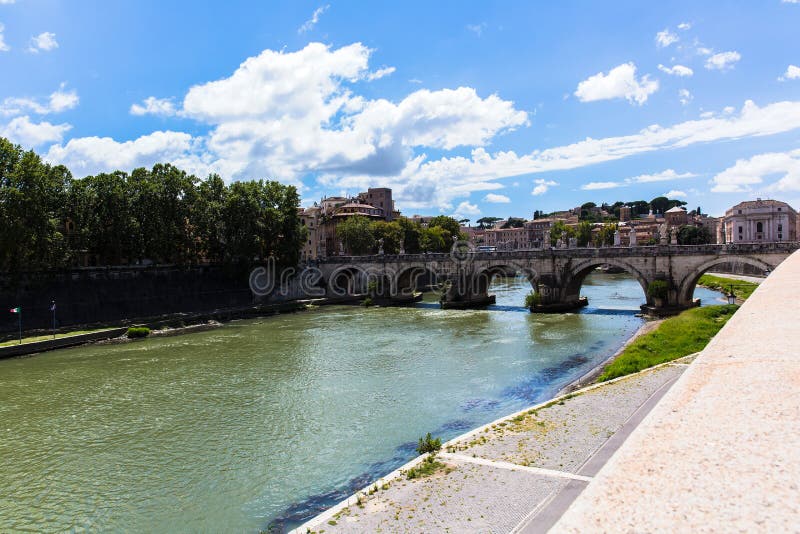 View of a River and Bridge in Rome Stock Photo - Image of water, cloud ...