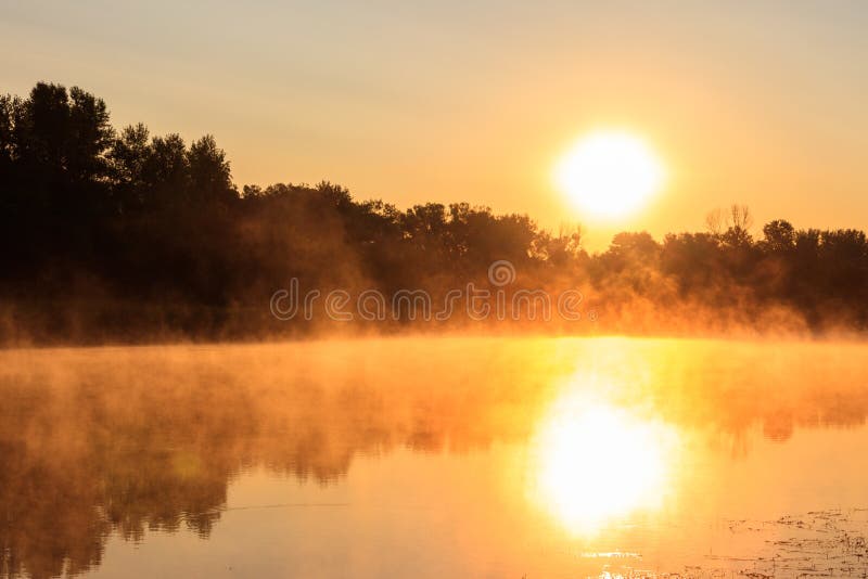View of River in the Mist at Sunrise. Fog Over River at Morning Stock ...