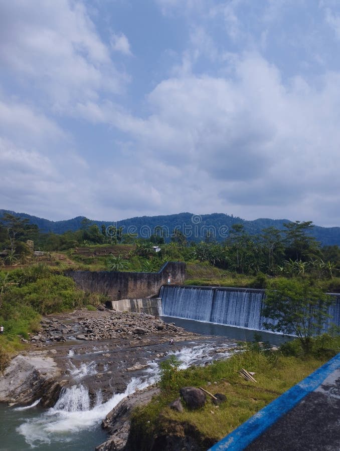 The View of the River with the Waterfall from the Dam and the View of ...