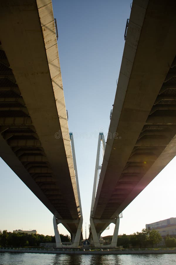 View of the Road Bridge Across the River from Below. Vertical Photo ...