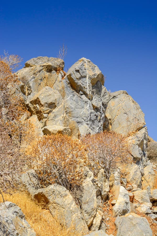 View in with a Rock on the Island of Crete Against the Blue Sky Stock ...