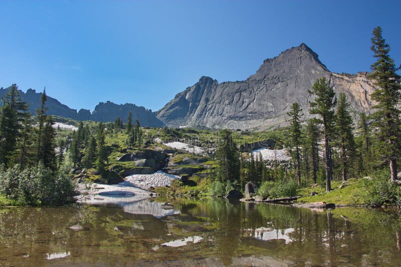 The View of the Rock Sleeping Sayan from the Coast of the Lake Stock ...