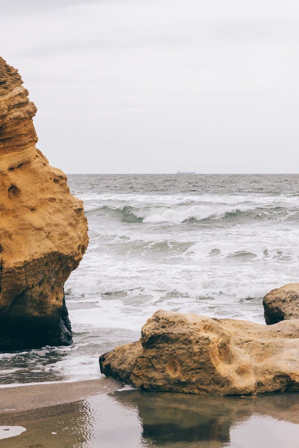 View of the Rocks and the Sea from the Beach Stock Photo - Image of ...
