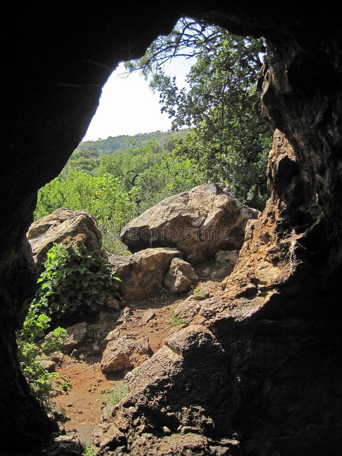 CAVE OPENING AND CAVERNS IN LARGE ROCK Stock Photo - Image of caverns ...
