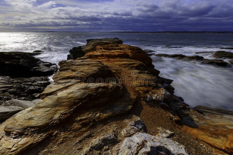 Sunset on a rocky shore stock image. Image of outdoor - 173395073