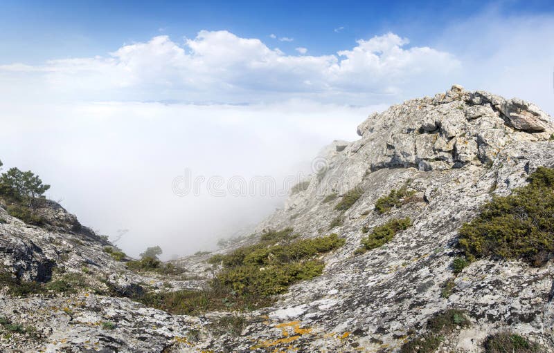 View from the Rocky Top of the Mountain Above the Clouds Stock Image ...
