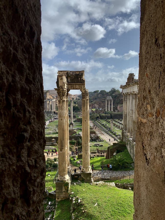 View of the Roman Forum through an Ancient Arch Stock Photo - Image of ...