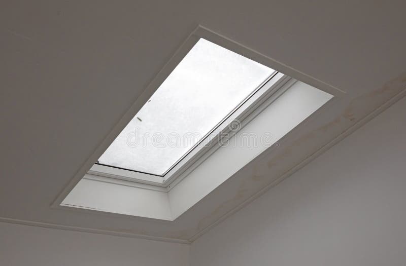 View through the Roof Window Covered by Melted Snow from Inside the ...