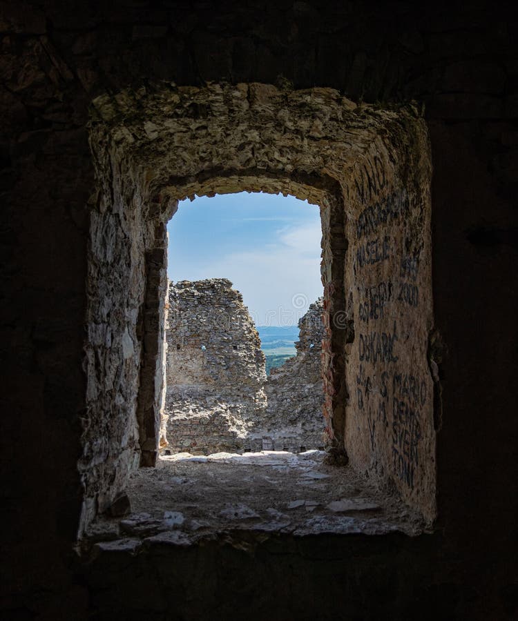 View of the Ruins of the Old Building through a Stone Arch on a Sunny ...