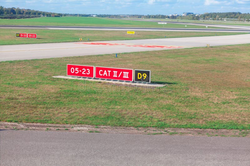 View of the Runway with Road Signs Stock Photo - Image of traffic ...