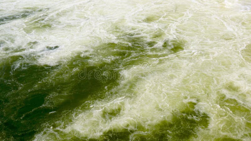 View of Rushing Water Flow Out from a Hydro Electric Dam. Stock Video ...