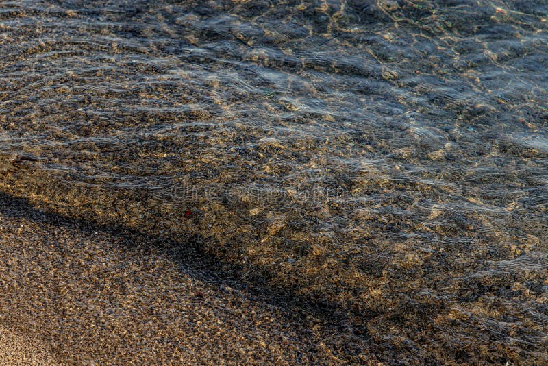 Close up sand and sea stock image. Image of tropical - 251673741