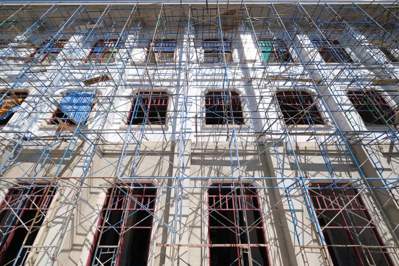 Building Under Construction with Scaffold in Front Stock Image - Image ...