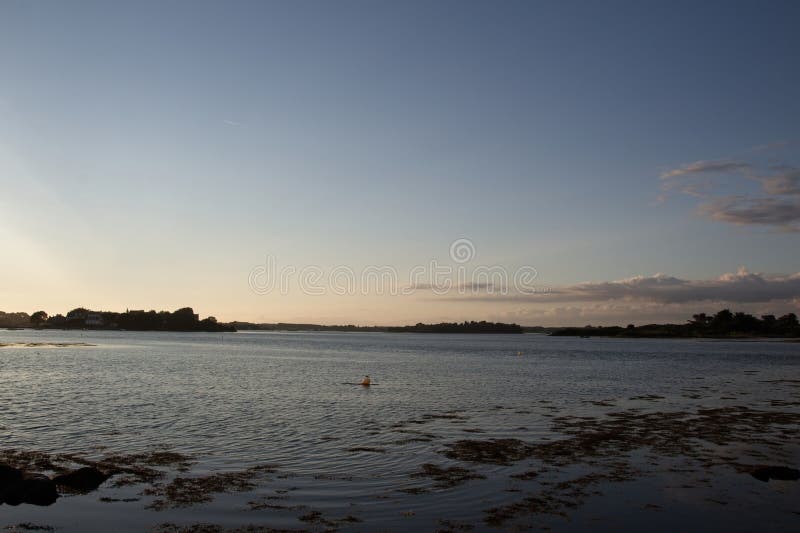 View of the sea and beach stock photo. Image of boat - 256009846