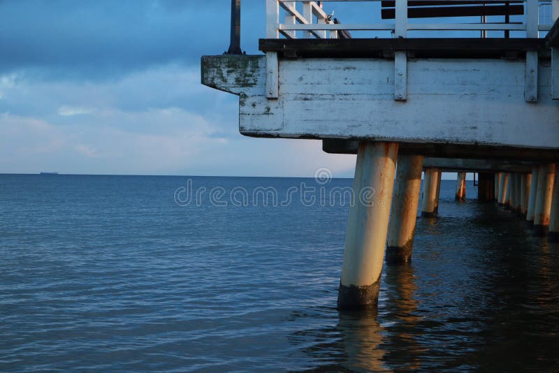View of the Sea Water Under the Pier. Columns of the Pier. Pier on the ...
