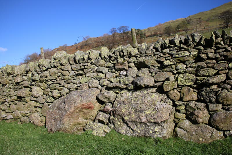 Dry Stone Wall with Large Boulders at Base, Cumbria, UK Stock Photo ...