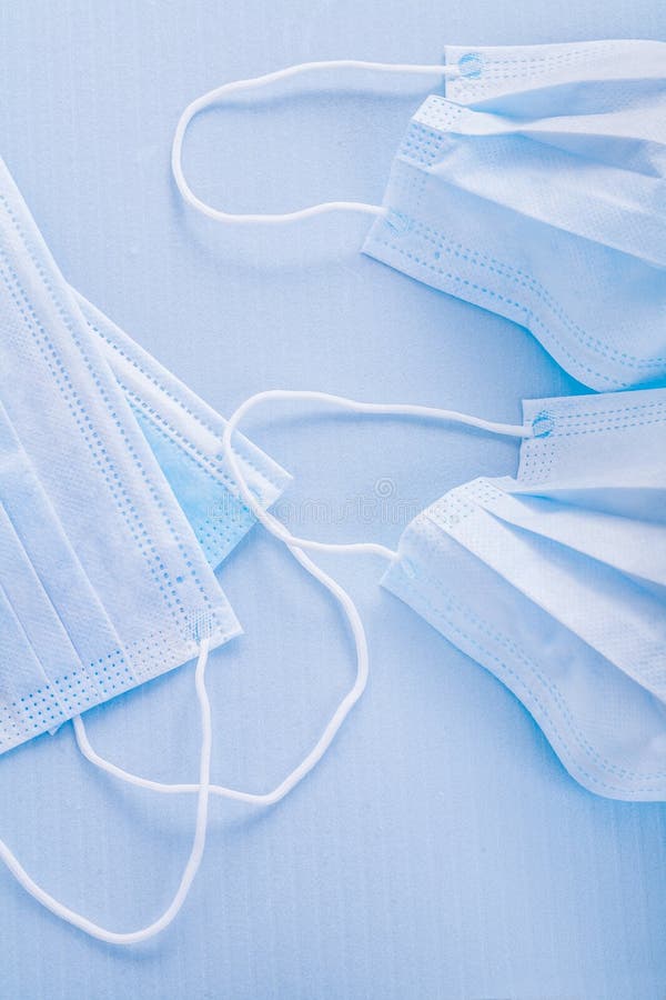 View Set of Disposable Face Masks on Blue Stock Photo - Image of doctor ...