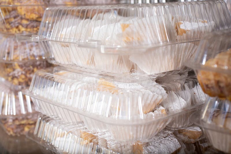 Stack of Plastic Containers Full of Cookies and Pastries Stock Photo ...