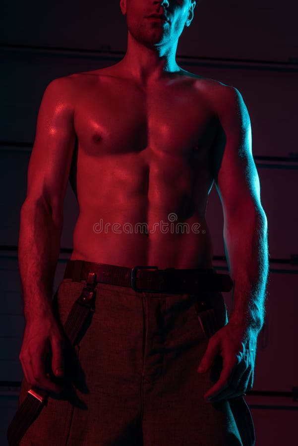 Shirtless Fireman in Helmet Holding Flat Head Axe and Screaming in ...