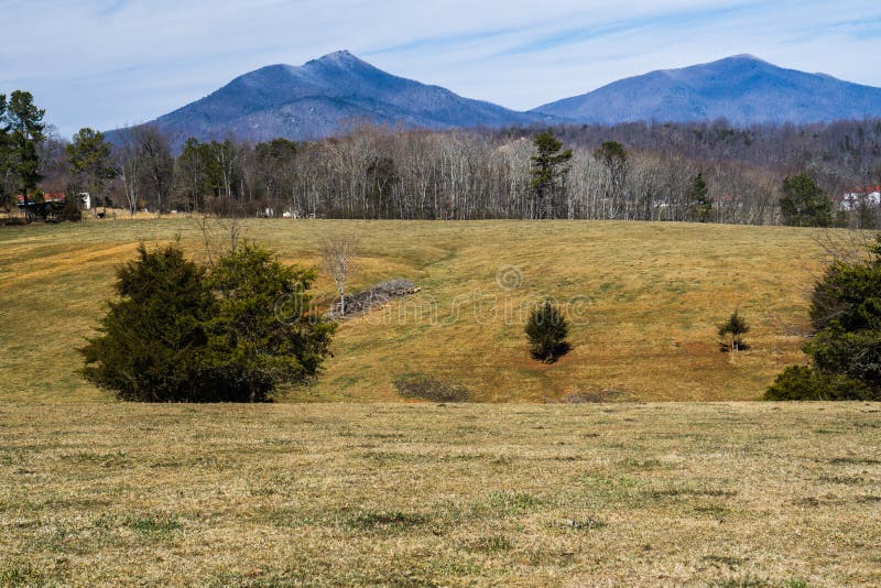 View of Sharp Top and Flat Top Mountains Stock Image - Image of farming ...