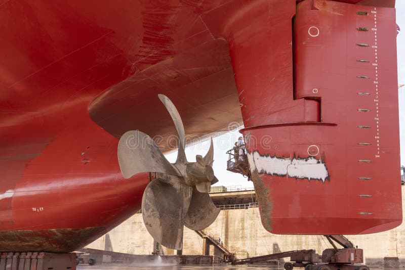 View on the Ships Rudder and Propeller. Ship in a Dry Dock. Stock Photo ...